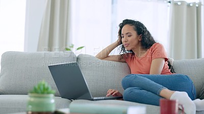 Crying, depression and sad woman on a living room sofa with a tissue ...