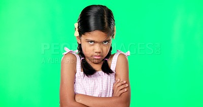 Angry, crossed arms and face of child on green screen with upset ...