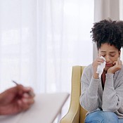 Crying, woman and counseling of psychologist for therapy, mental health ...