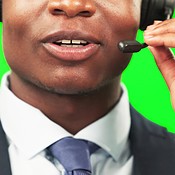 Black man, closeup and callcenter with green screen, CRM and contact us with face. Male customer ...