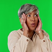 Green screen, anxiety and senior woman with scared, fear and worry ...