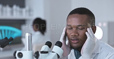 Black man scientist, laboratory microscope and shoulder pain of a ...
