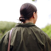 Back, walking and business woman at park for travel, journey and trip ...