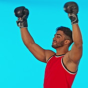 Boxer, man and celebration, winner or champion in studio isolated on a ...