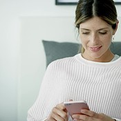 Just scrolling through his timeline | Buy Stock Photo on PeopleImages ...