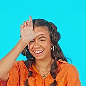 Woman, laughing and loser sign on face with pointing for joke, bullying ...