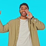 Man, face and wave hello in studio with shouting for sound by blue ...