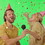 Green screen, party and couple on karaoke for a birthday celebration ...