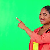 Happy, woman pointing for checklist and against a green screen for ...