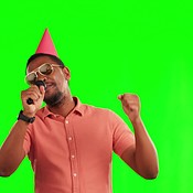 Microphone, dance and man in a studio with green screen singing karaoke ...