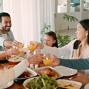 Thanksgiving toast with a big family of children, parents and ...