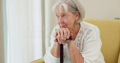 Senior woman, face and thinking by window at home to remember memory and relax in retirement ...