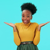 Shrug, face and young woman in a studio with an unsure, choice or ...