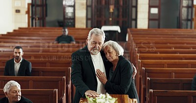 Funeral, church and couple hug by coffin for goodbye, mourning and ...