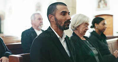 Sad, man and depression at a funeral in church for religious service ...