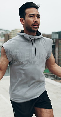 Asian man, fitness and jumping rope on rooftop in city for workout ...