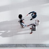 Above, business people and shaking hands in meeting, office and ...