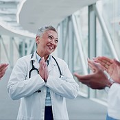 Doctors, nurses and applause for support, thank you and success of ...