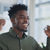 Happy black man, fist pump and celebration in winning, good news or ...