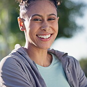 Smile, fitness and face of woman in park for running, thinking and ...