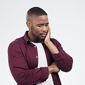 Stress, depression and sad black man in studio with doubt, mistake or ...