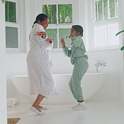 Play, kid or mother dancing in bathroom grooming or cleaning in happy ...