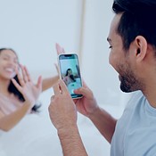 Couple, happy and photography on phone in bedroom, bonding in ...