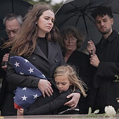 Funeral, family and sad people with American flag, grief and mourning ...