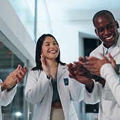 Applause, nurses and doctors in celebration together for success, achievement or promotion in ...