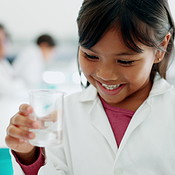 Girl, chemistry and child scientist, chemical in beaker with education ...