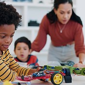 Black child, robotics and learning in school, studying and knowledge of ...