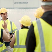 Factory, meeting and group with question for manager and safety ...