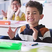 School kids, boy and applause in classroom, happy and excited for ...