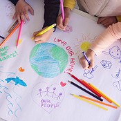 Kids in classroom, drawing and art from above for earth day, eco ...