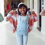 Strong, children and flexing muscle with happiness at school for growth ...