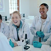 Laboratory, university and professor with students, funny and research ...