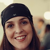 Waitress, face and woman at a cafe for service, working and a job at a ...