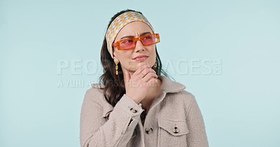 Studio, fashion sunglasses and face of woman thinking about clothes ...