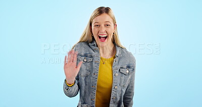 Face, wave hand and excited woman in studio isolated on blue background ...