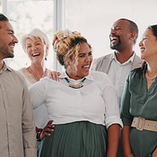 Business, team and conversation with smile, relax and planning strategy ...