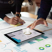 Business people, data analysis with tablet and documents, hands with ...