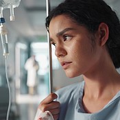 Woman, patient and iv drip, healthcare at hospital for wellness ...