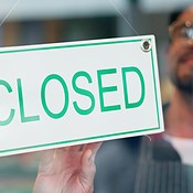 Door closed sign, smile and restaurant man, small business owner or ...