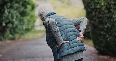 Old woman, back pain and fitness injury outdoor, spine and workout with ...