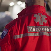Back, man and paramedic walking to ambulance for emergency, ems service ...