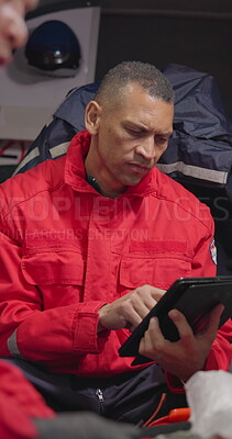 Tablet, paramedic and a man in an ambulance for emergency service or ...