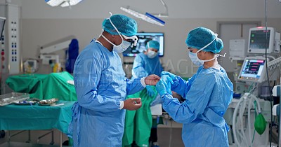 Surgeon mask, gloves and nurse help with dressing, preparation and ...