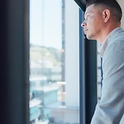 Window, thinking and business with ideas, man and solution with problem ...