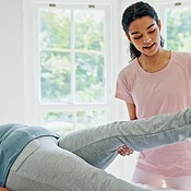 Rehabilitation for legs, physical therapy and physiotherapist with ...