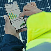 Solar panels, person hands and phone screen for data analysis of eco ...
